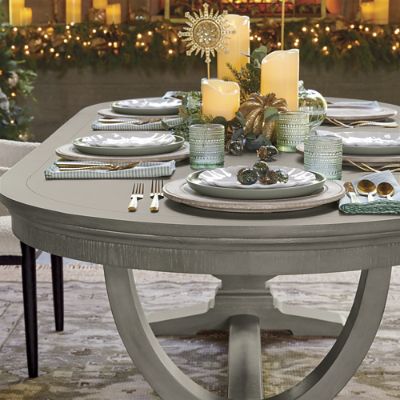 Cheval Expandable Oval Dining Table with Trestle Base & Two 18" Leaves